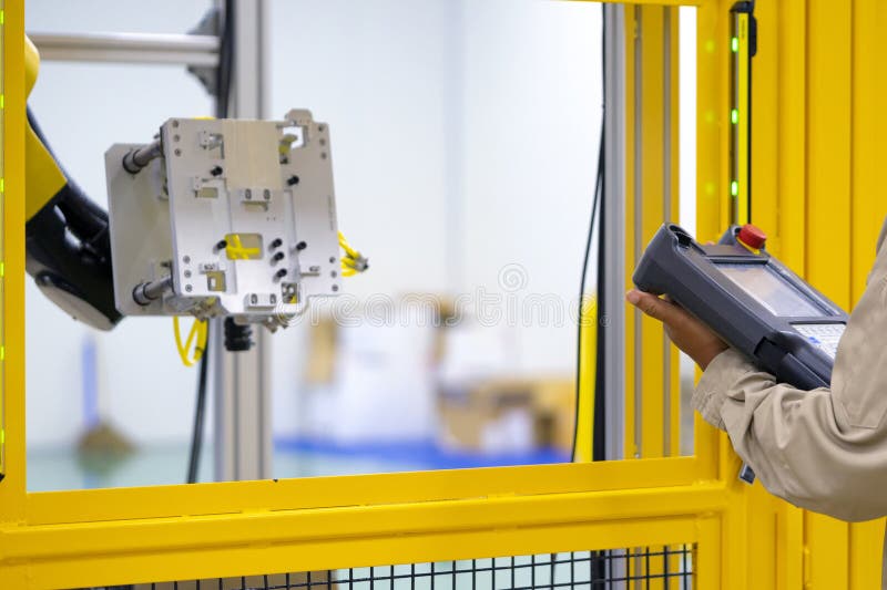 An Engineer Use Controller for Setting Robot Stock Photo - Image of ...