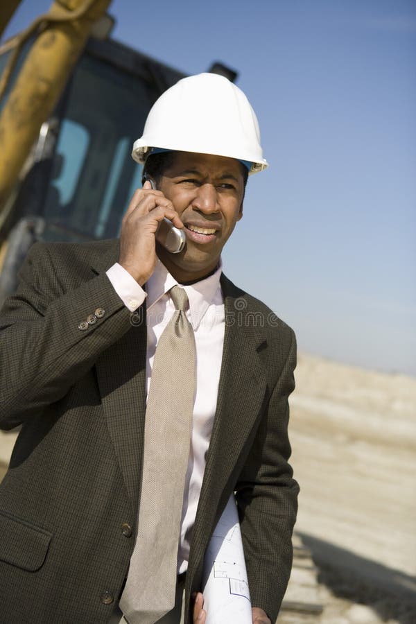 Engineer a Construction Site Using Cellphone Stock Image - Image of ...