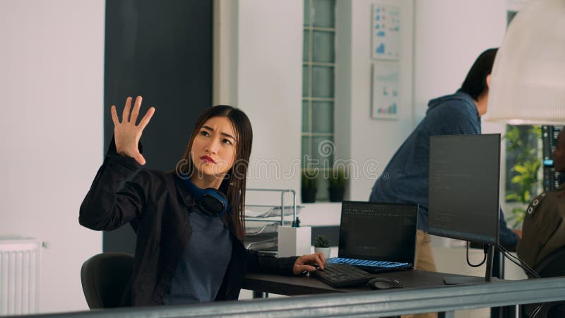 It Engineer Using Computer And Turning Head To Use Source Code Hologram Stock Image Image Of