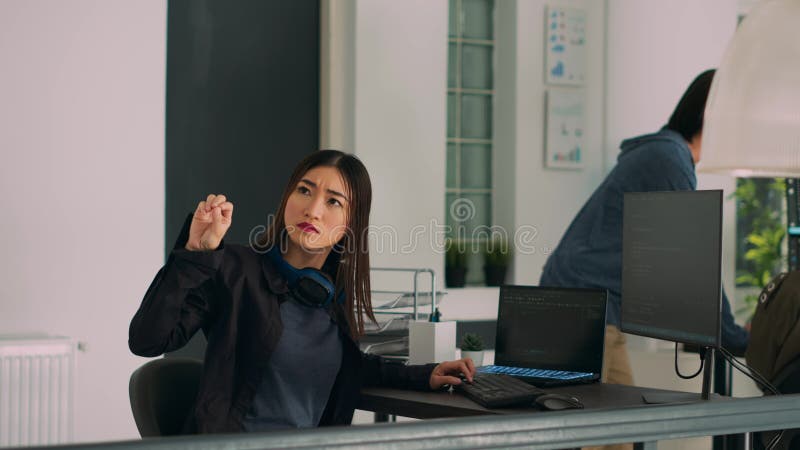 It Engineer Using Computer and Turning Head To Use Source Code Hologram ...