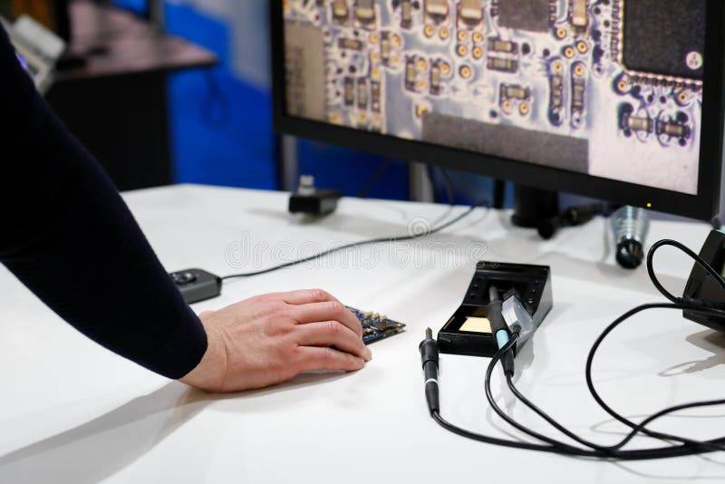 Engineer Using a Digital Microscope for Inspection Stock Photo - Image ...