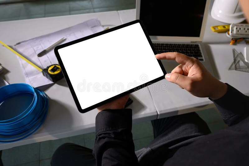 Engineer Using Digital Tablet Construction Planning Desk Tools ...