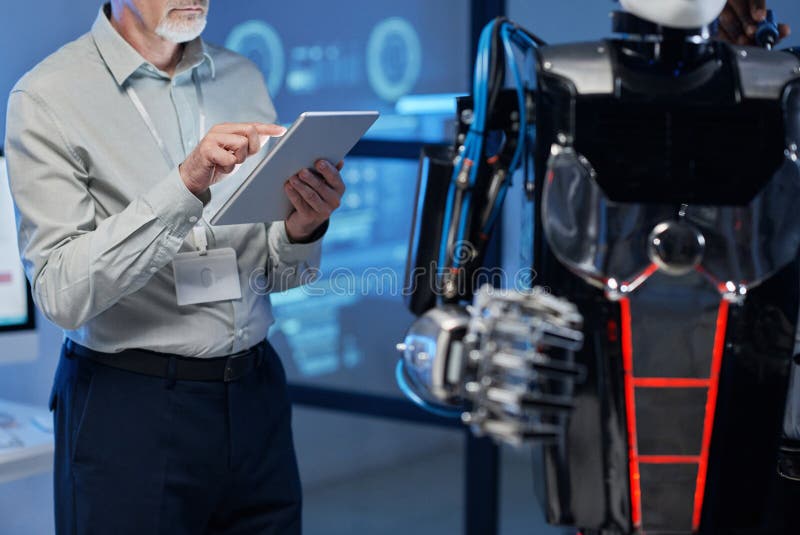 Engineer Using Digital Tablet To Connect with Robot Stock Image - Image ...