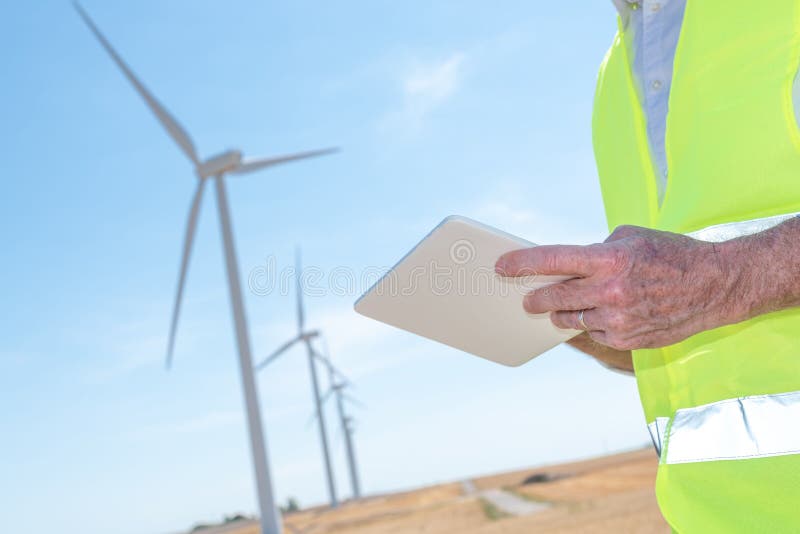 Engineer Using Digital Tablet for Wind Turbine Inspection Stock Image ...