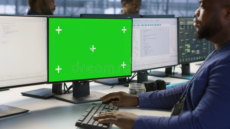 Engineer Using Green Screen Computer, Working in Server Farm Stock Photo - Image of hardware ...