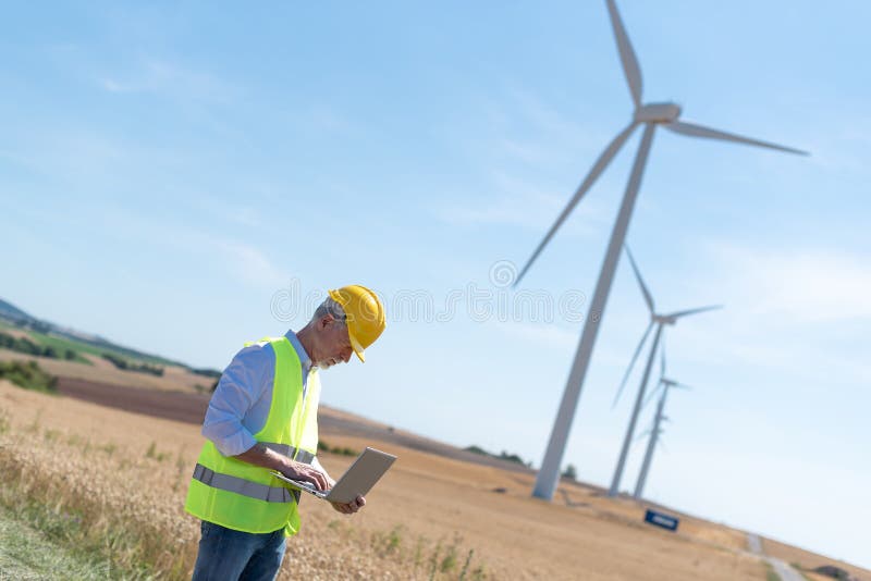 Engineer Using Laptop for Wind Turbine Inspection Stock Image - Image ...