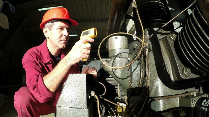 Engineer Using Laser Thermometer Gun Stock Footage - Video of ...