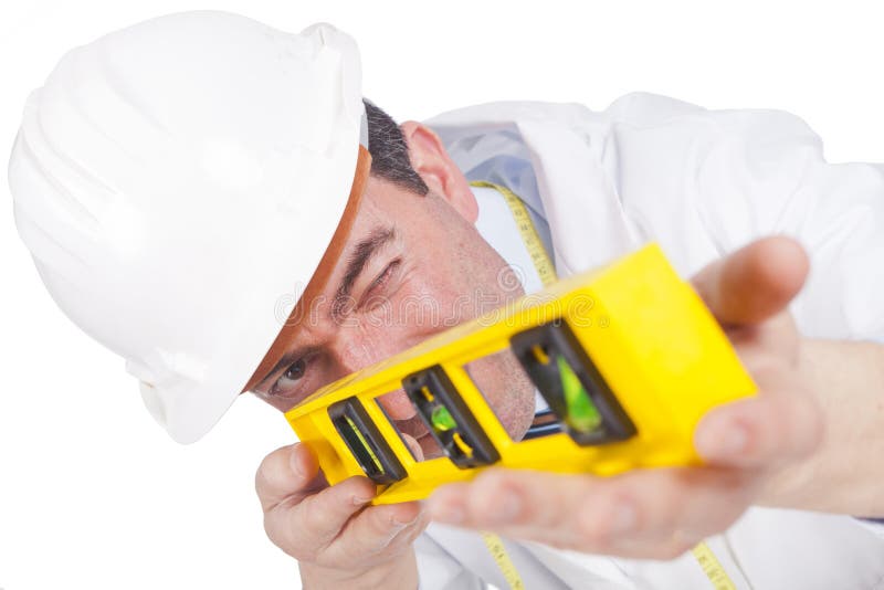 Engineer using a level stock photo. Image of helmet, right - 24119056