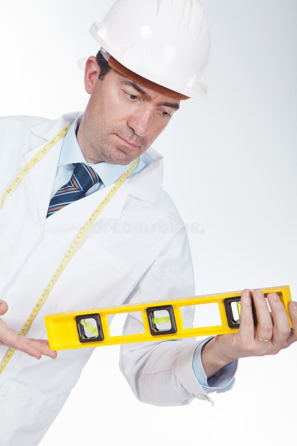 Engineer using a level stock photo. Image of gesture - 24273894