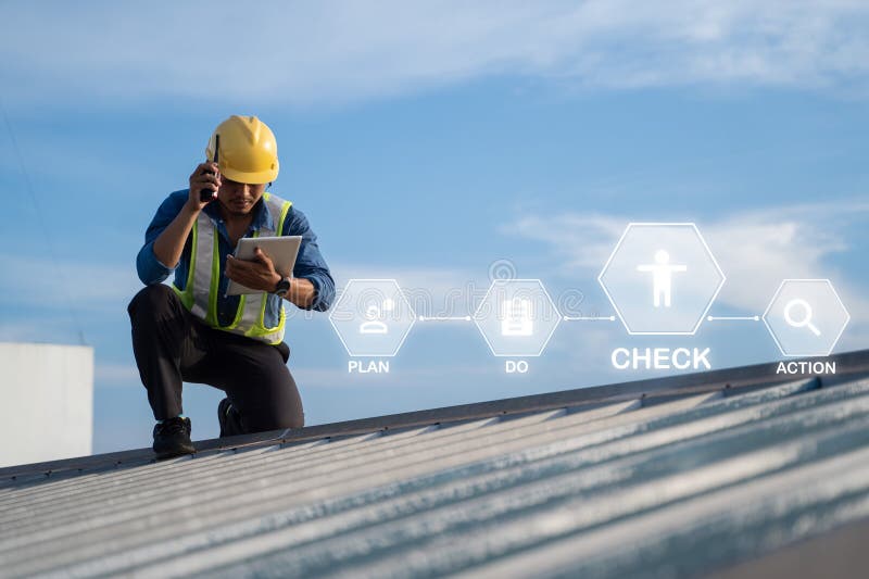 Engineer Using Tablet To Inspect Work at Job Site. Stock Image - Image ...