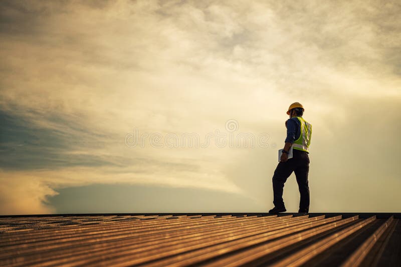 Engineer Using Tablet To Inspect Work at Job Site Stock Photo - Image ...