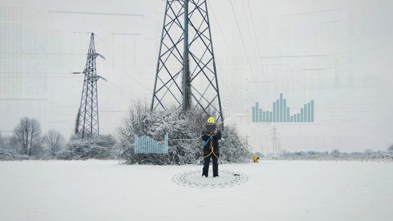 Engineer Using Technology To Service Electricity Pylon in Snow, Graphic ...