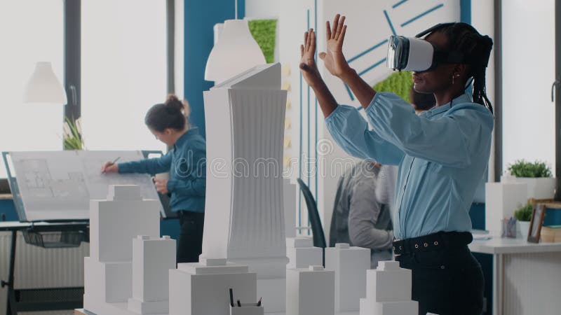 Engineer Using Vr Glasses To Design Building Model and Construction for ...