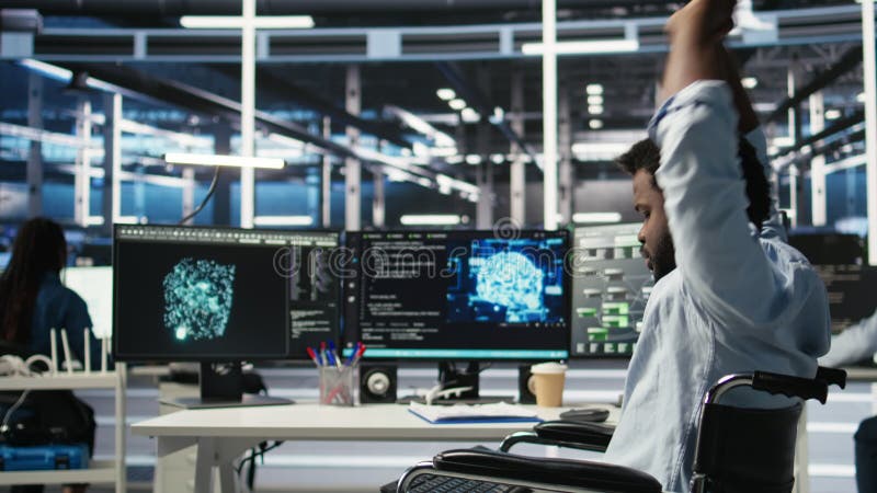 Engineer Using Wheelchair in Data Center Using AI Node Tree Software Stock Footage - Video of ...