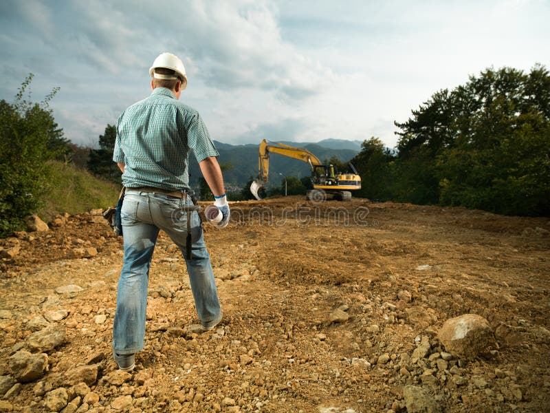 Engineer Walking on Construction Site Stock Image - Image of blueprint ...