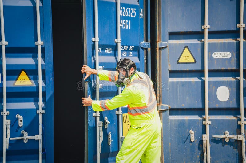 Engineer Wear PPE Checking Inside Container As Chemical Spill in the ...