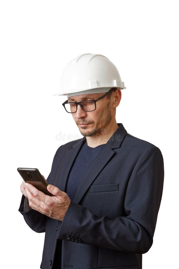 Engineer in a White Construction Helmet with Smartphone in Hand. Stock ...