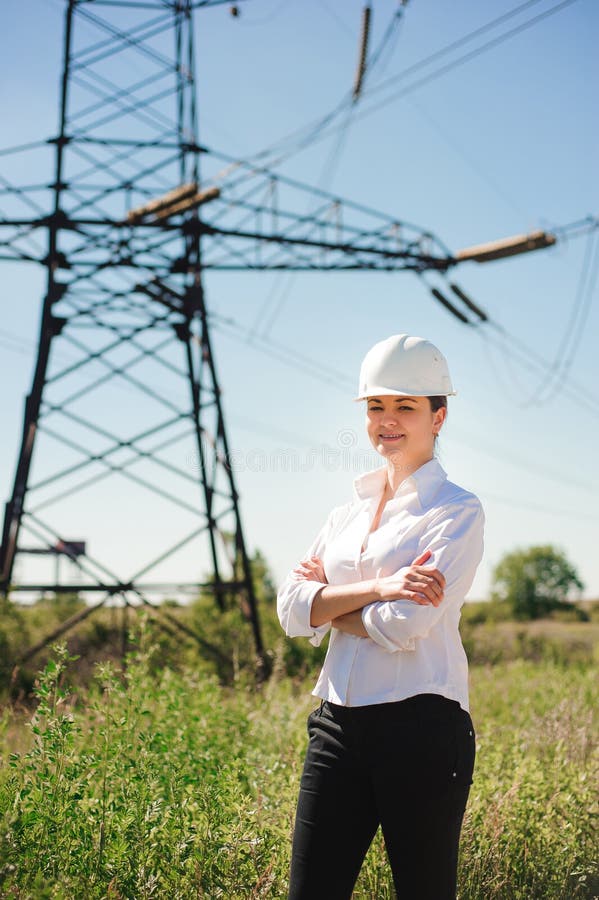 Beautiful Woman Engineer Work at an Electrical Substation. Stock Image ...
