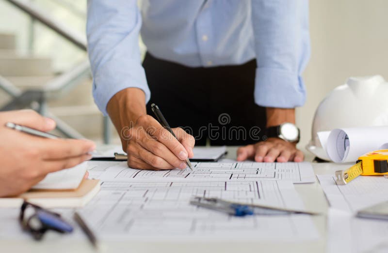 Engineer Who is Planning a Draft of the Structure. with Architect ...