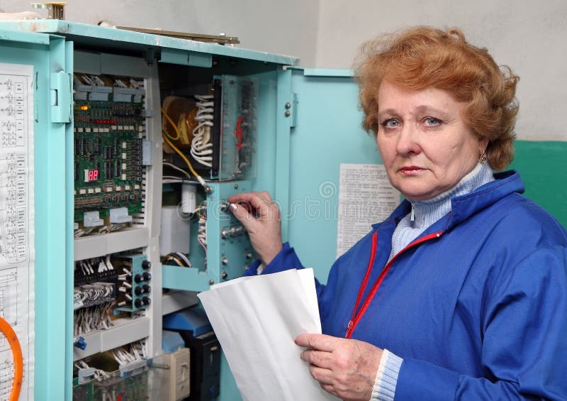 Engineer Woman in Machine Room (elevator) . Stock Photo - Image of ...