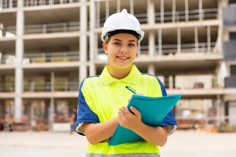 Engineer Woman with Paper Folder in Construction Site Stock Photo ...