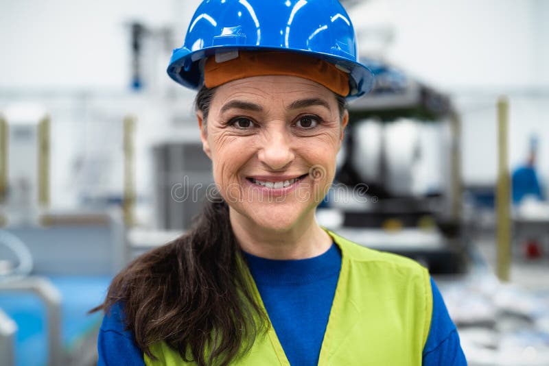 Engineer Woman Working Inside Robotic Factory Stock Photo - Image of ...