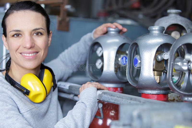 Engineer Woman Working with Machine in Factory Stock Photo - Image of ...