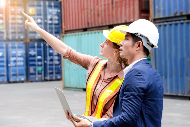 Engineer Women Point To Container and Control Loading by Using a ...