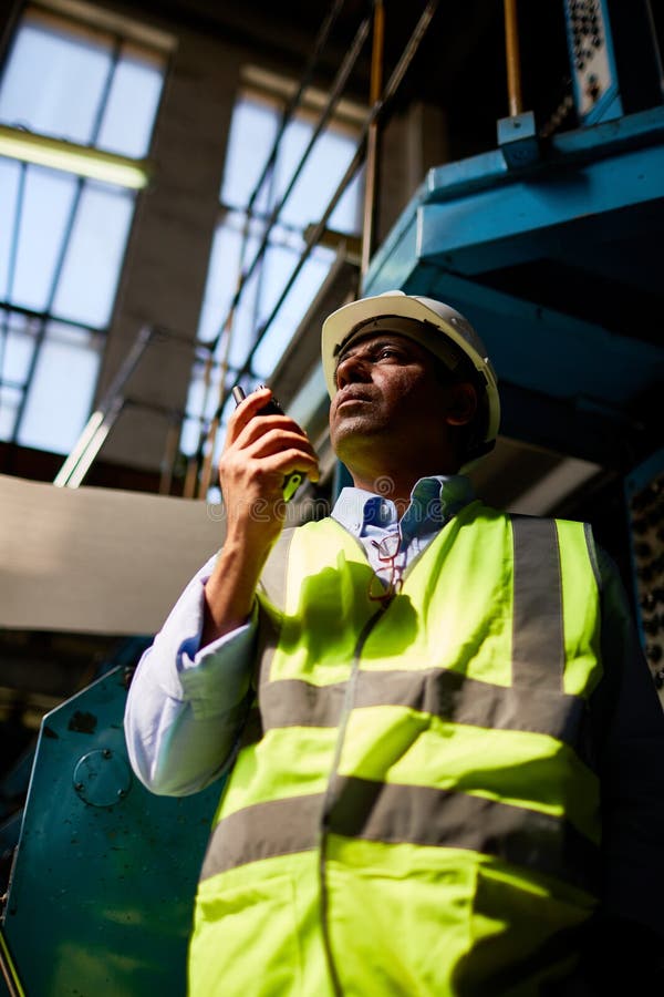 Engineer at work stock photo. Image of uniform, walkietalkie - 72600582