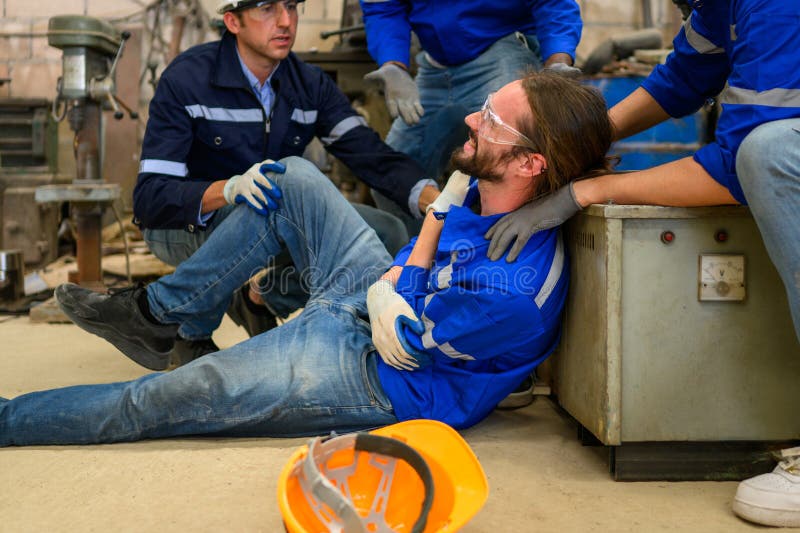 Engineer Worker with Accident at Factory Stock Photo - Image of painful ...