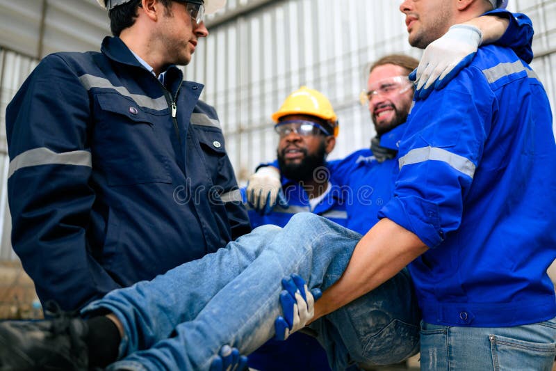 Worker with Accident at Factory, People with Injury from Hard Work in ...