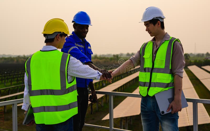 Engineer Worker Checking and Maintaining Solar Panels on Solar Farm ...