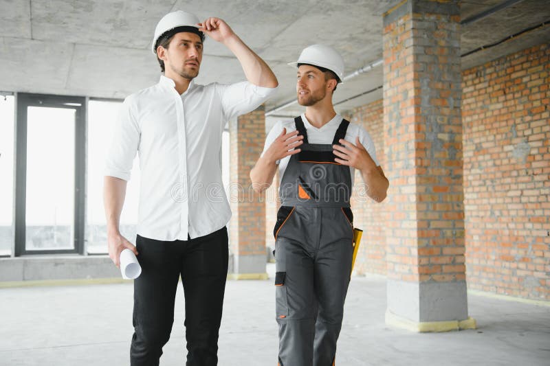 Engineer and Worker Checking Project at Building Site Background ...