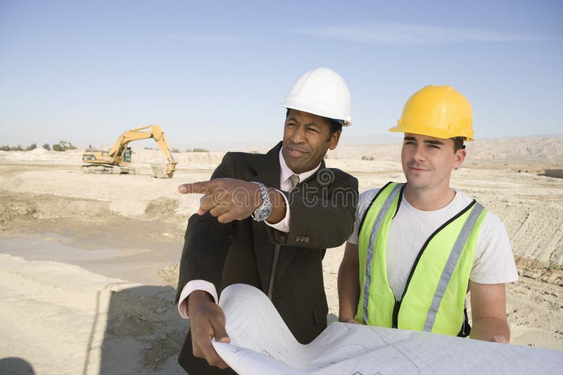 Engineer and Worker in Discussion at Site Stock Photo - Image of people ...