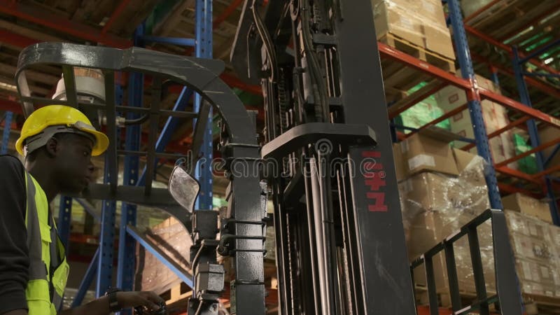 Engineer or Worker Going To Control Folk Lift Car in the Factory Stock ...