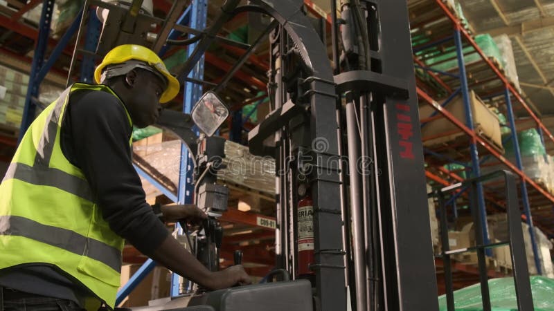 Engineer or Worker Going To Control Folk Lift Car in the Factory Stock ...