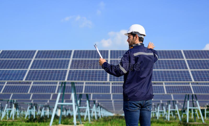 Engineer Worker Portrait with Solar Panel at Solar Farm Stock Photo ...
