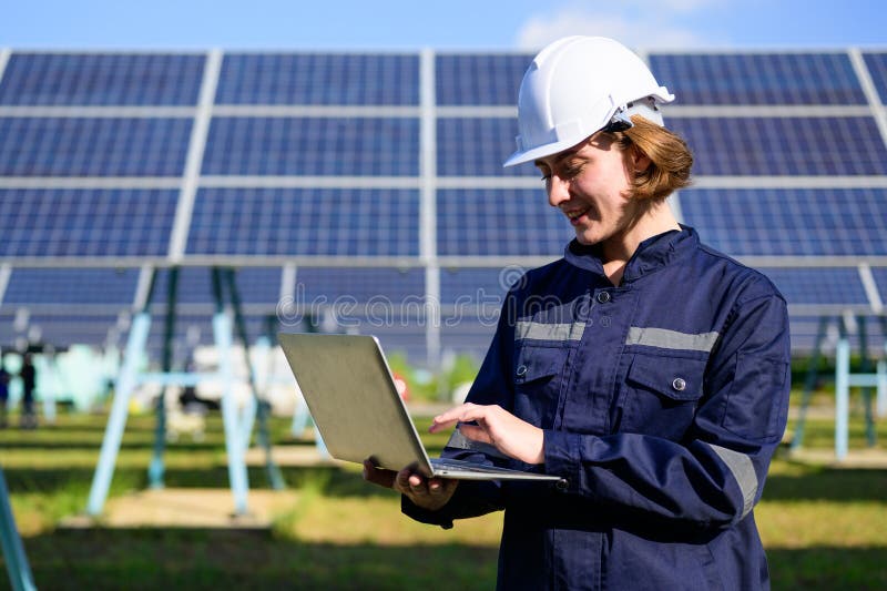 Engineer Worker Portrait with Solar Panel at Solar Farm Stock Photo ...