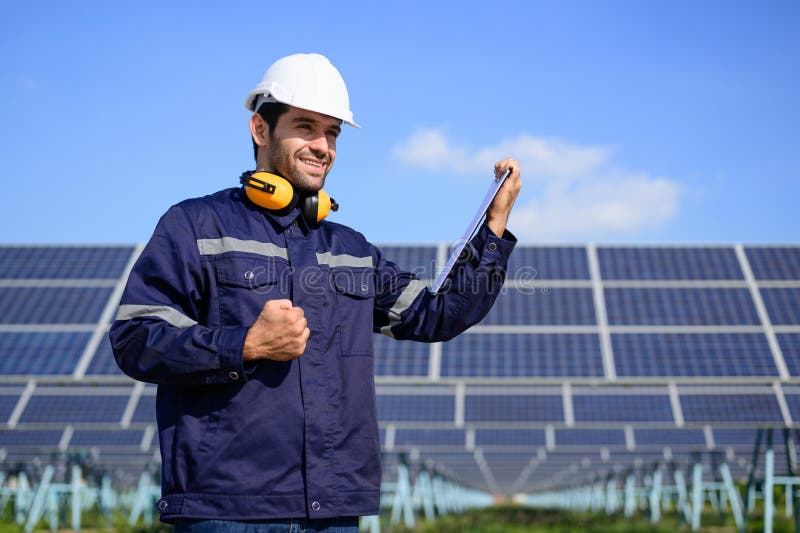 Engineer Worker Portrait with Solar Panel at Solar Farm Stock Photo ...