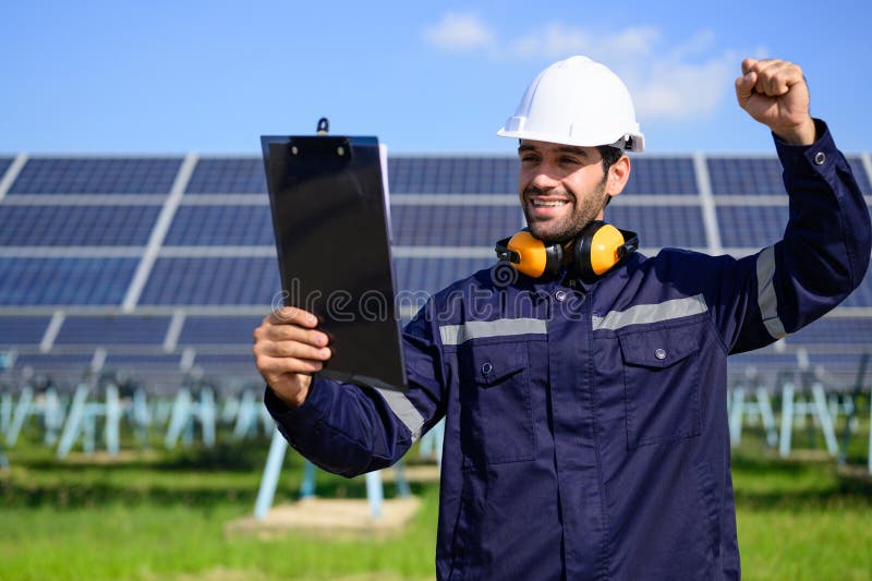 Engineer Worker Portrait with Solar Panel at Solar Farm Stock Photo ...
