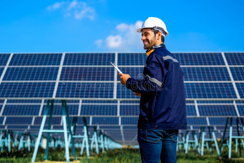 Engineer Worker Portrait with Solar Panel at Solar Farm Stock Photo ...