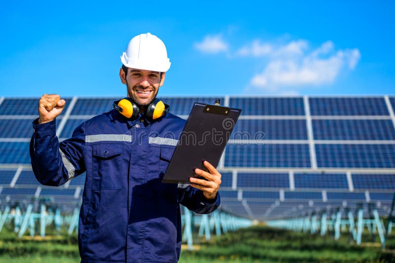 Engineer Worker Portrait with Solar Panel at Solar Farm Stock Photo ...