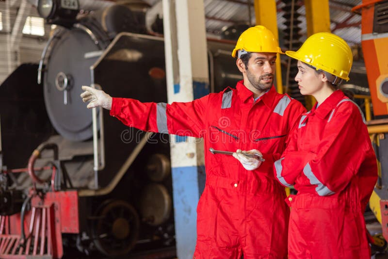 Engineer with Worker Talking Together at Factory Stock Image - Image of ...