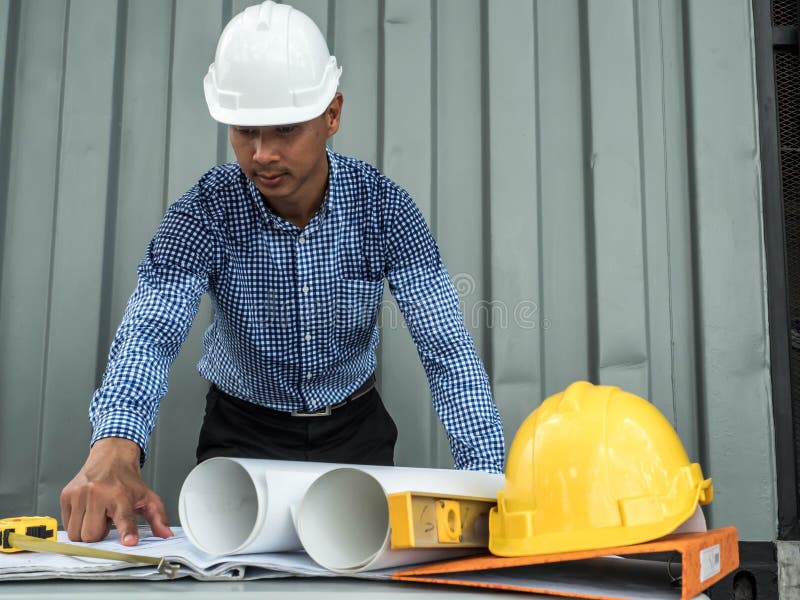 Two Engineer Discussing A New Project Stock Photo - Image of plant ...