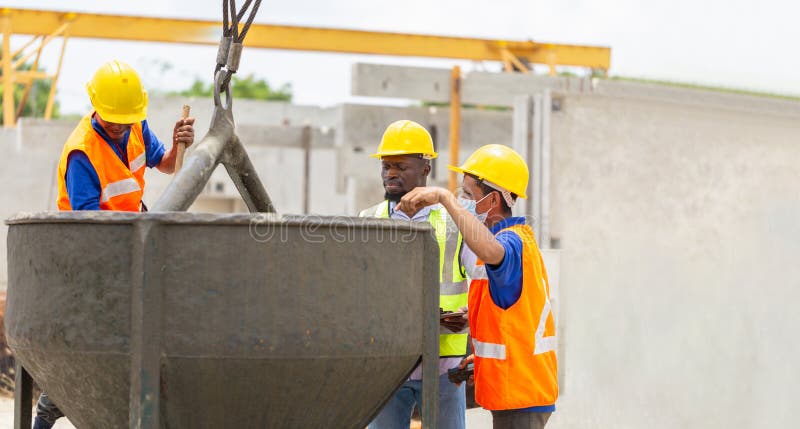 Engineer and Workers Team Discussing at Precast Concrete Factory Site ...