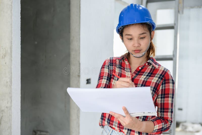 Engineer Working Alone at Construction Site Stock Photo - Image of ...