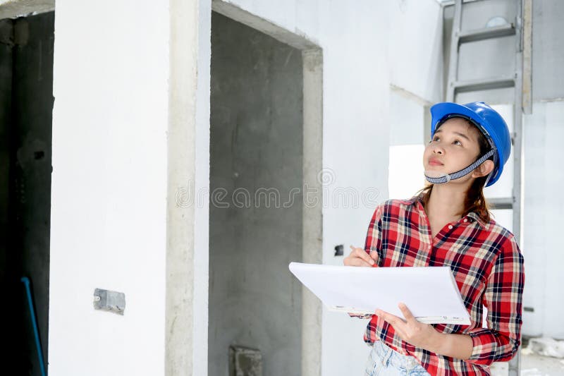 Engineer Working Alone at Construction Property Site. Architecture with ...