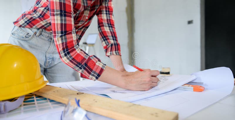 Engineer Working Alone at Construction Property Site. Architecture with ...