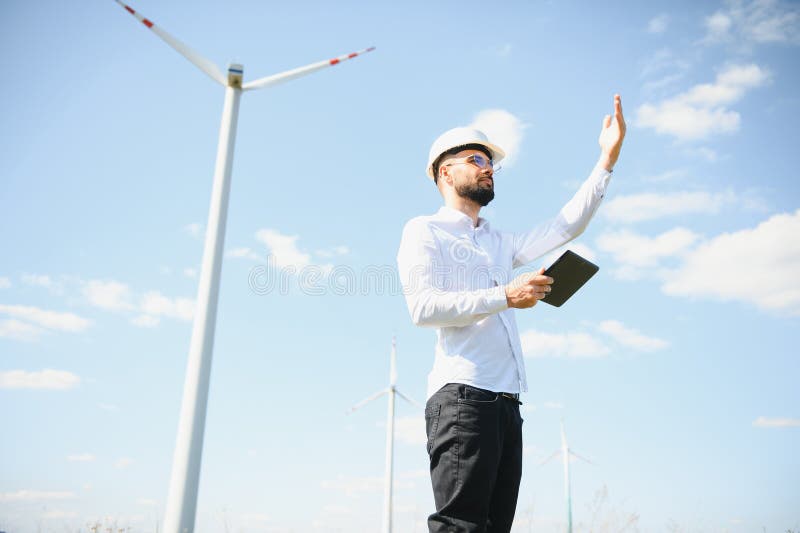 Engineer Working at Alternative Renewable Wind Energy Farm ...