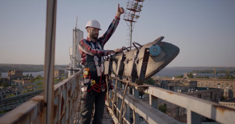 Engineer Working on a Cellular Tower Stock Video - Video of outdoors ...